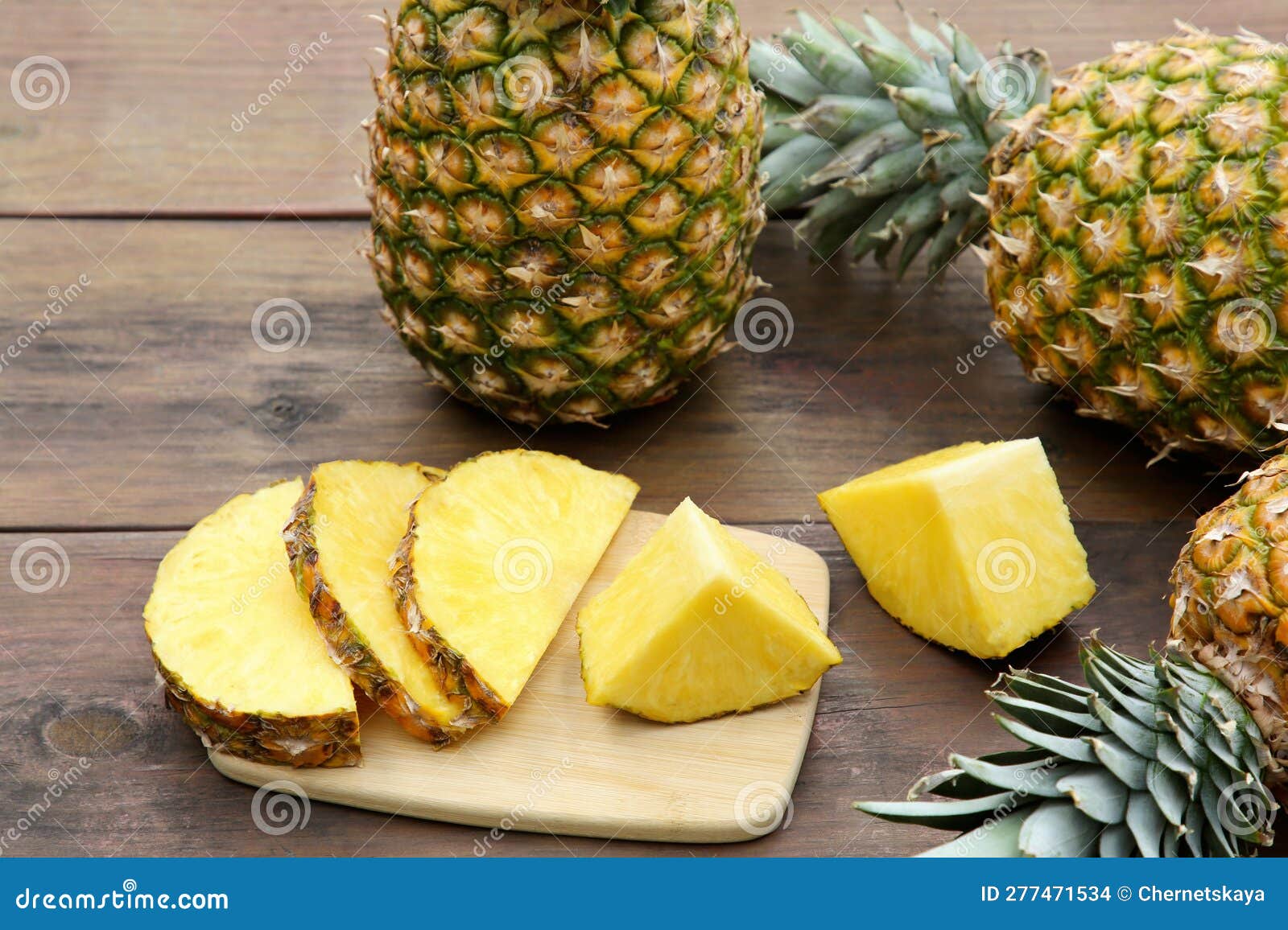 Cut and Whole Ripe Pineapples on Wooden Table Stock Photo - Image of ...