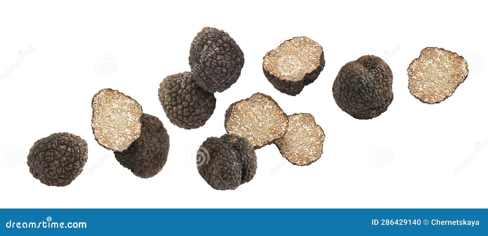 Cut and Whole Truffles Falling on White Background Stock Photo - Image ...
