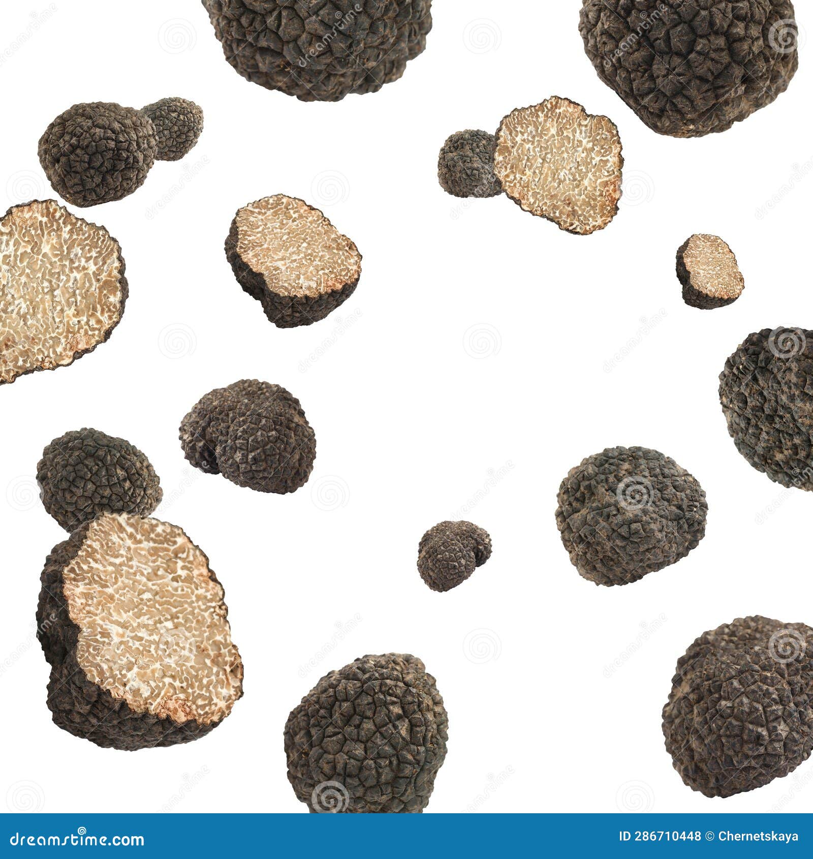 Cut and Whole Truffles Falling on White Background Stock Photo - Image ...