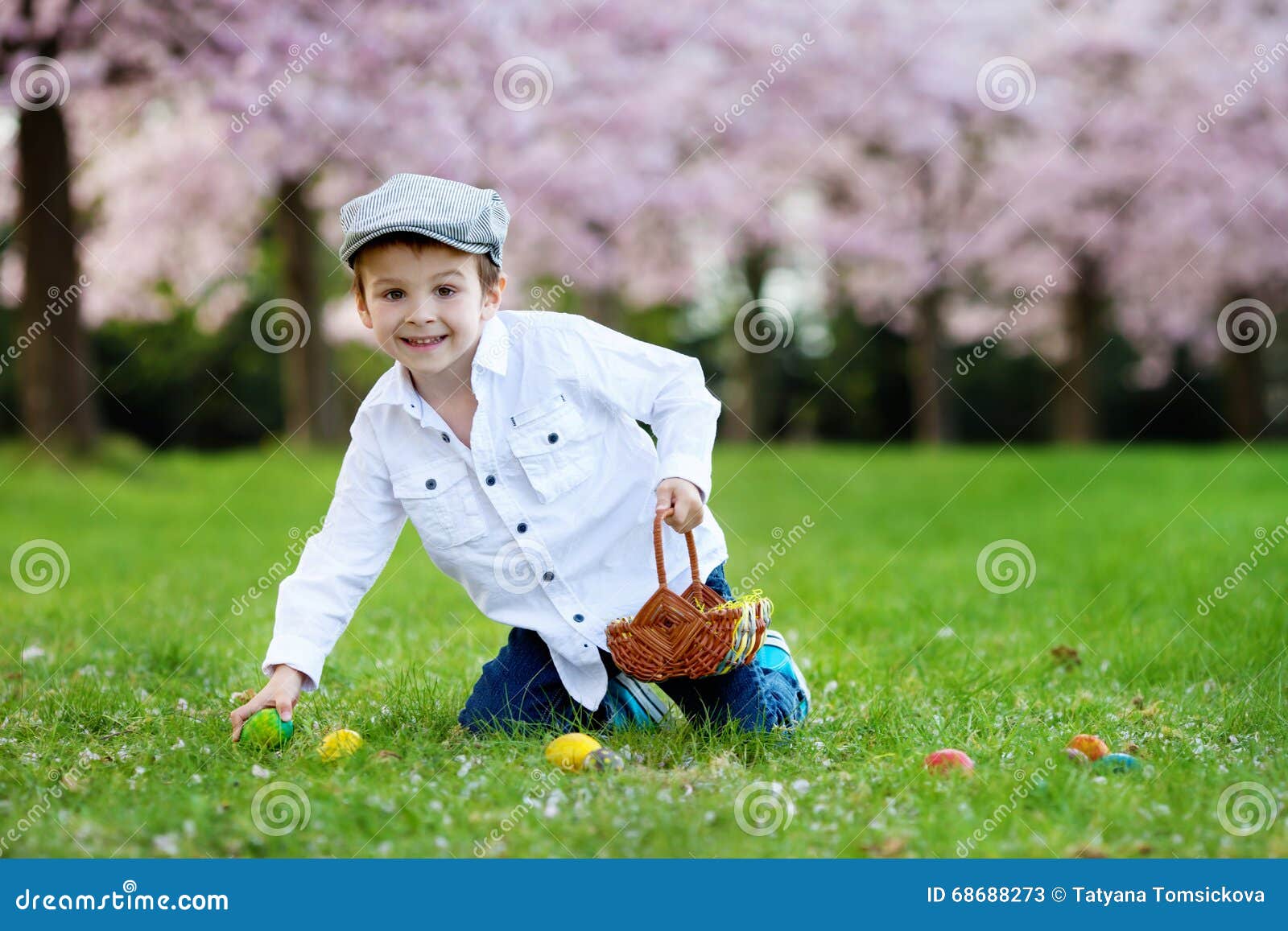 Cute Adorable Boy, Gathering Easter Eggs in a Spring Blooming Ch Stock ...