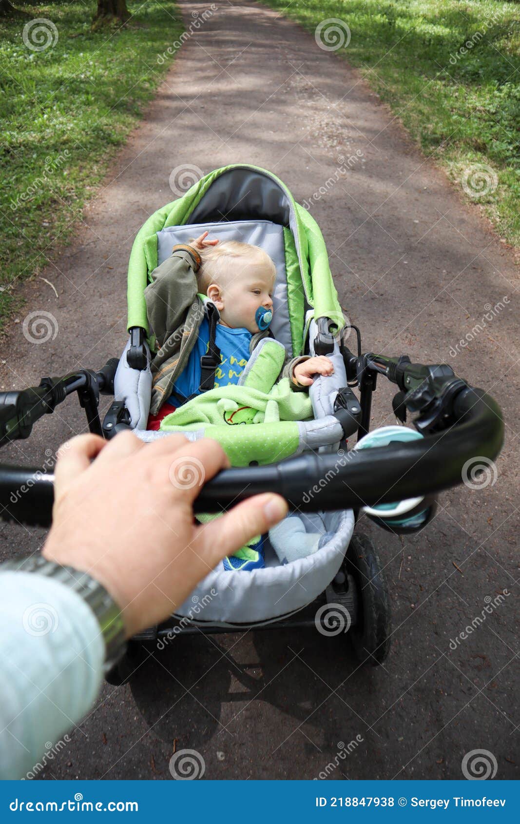 Cute Adorable Infant Child Sitting in a Stroller Walk in the Park ...