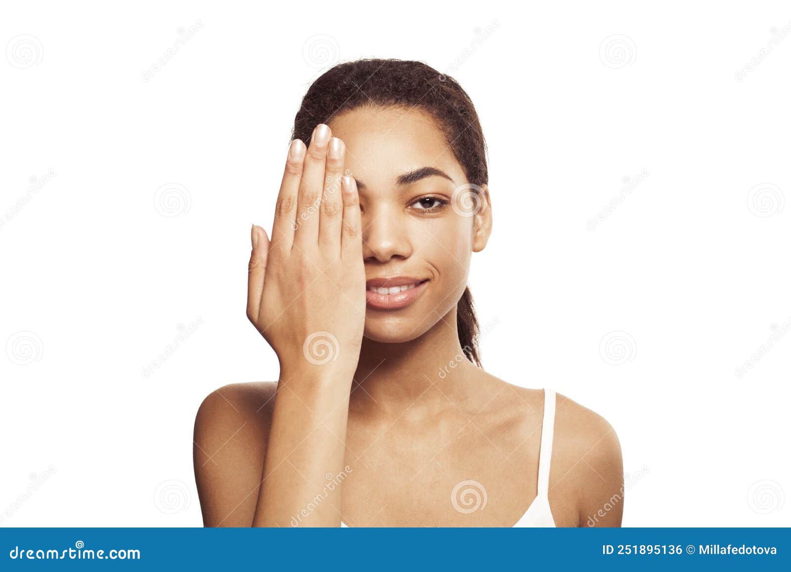Cute African American Woman Smiling And Holding Her Hand Near Her Face
