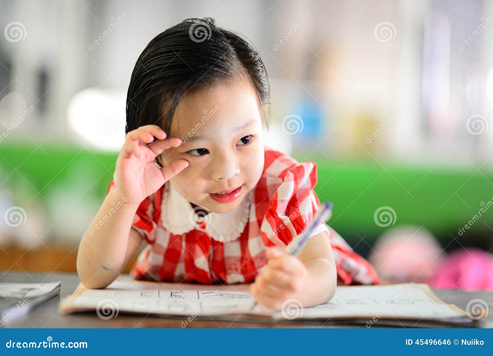 Cute Asian Girl Doing Her Homework. Stock Photo - Image of kindergarden ...