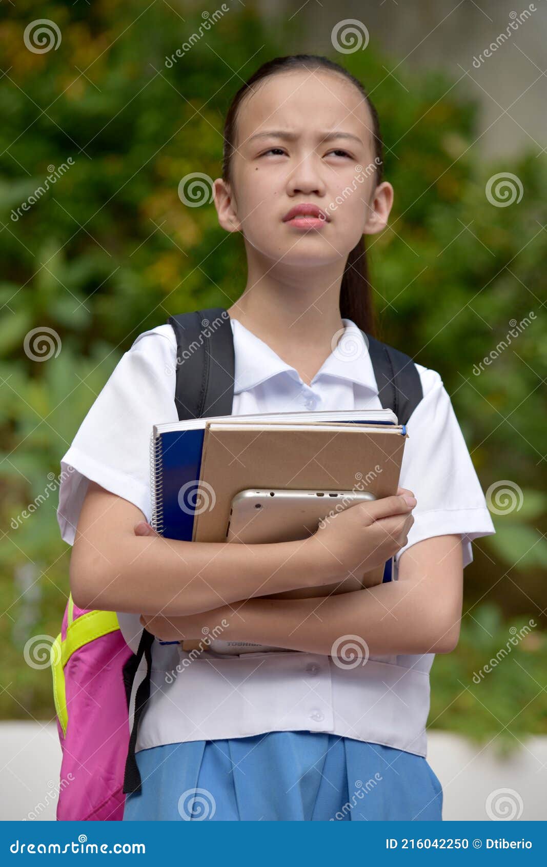 A Cute Asian Girl Student Wondering Stock Photo - Image of cute, wonder ...