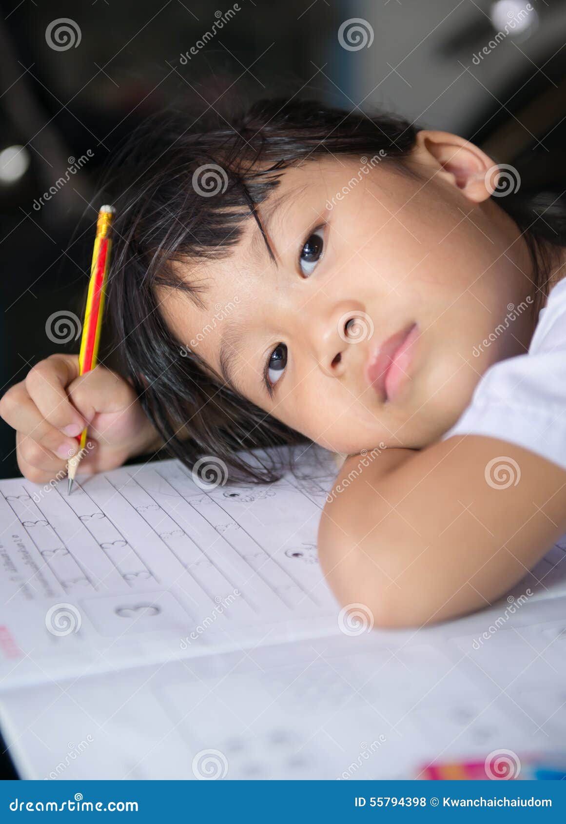 Cute Asian Girls is Doing Her Homework. Stock Photo - Image of ...