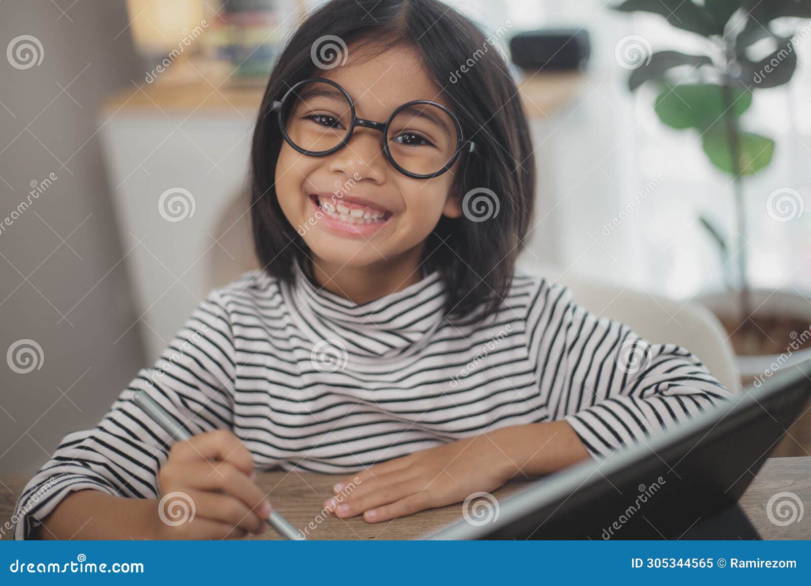 Cute Asian Little Girl Children Using a Laptop Computer, Studying ...