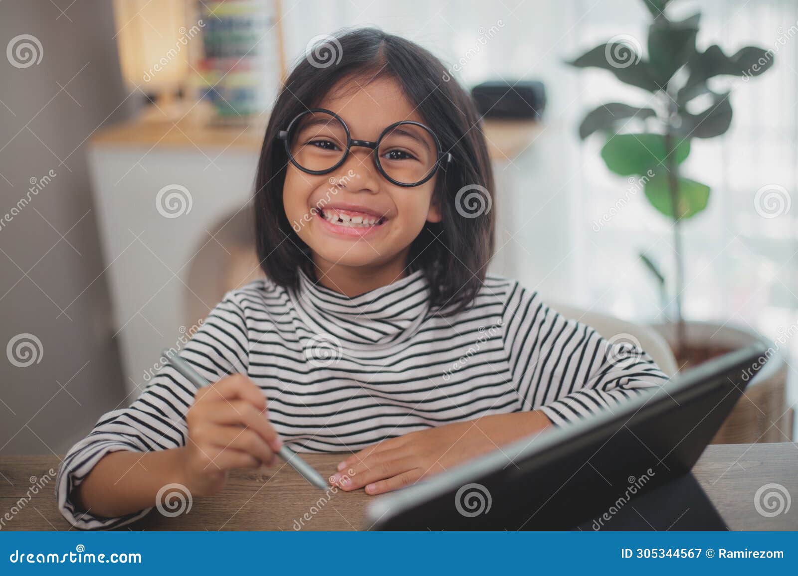 Cute Asian Little Girl Children Using a Laptop Computer, Studying ...