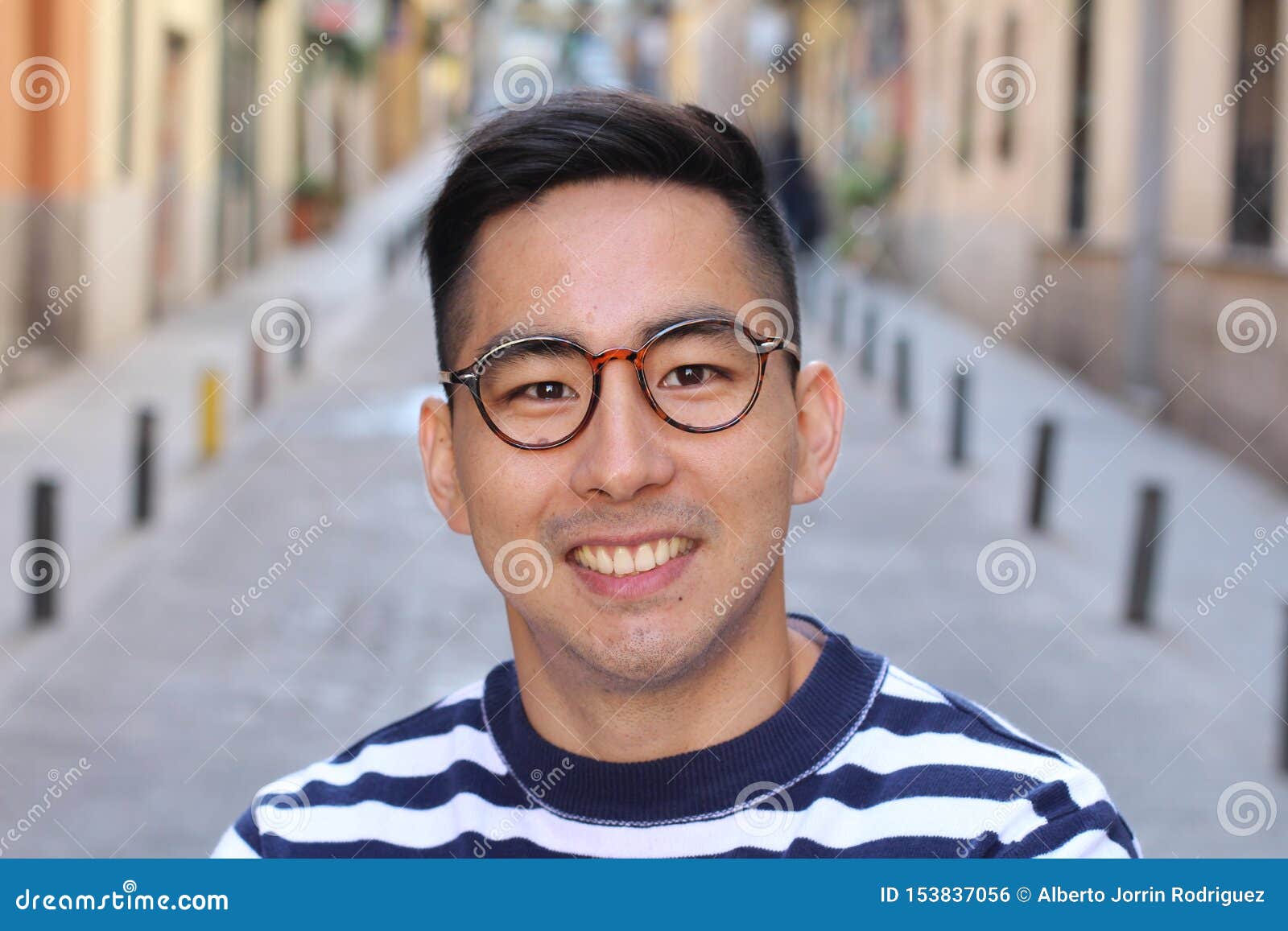 Cute Asian Man Smiling Outdoors Stock Photo - Image of japanese, asian ...