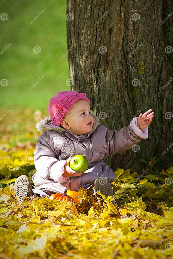 Cute baby with apple stock image. Image of cold, eating - 16779241