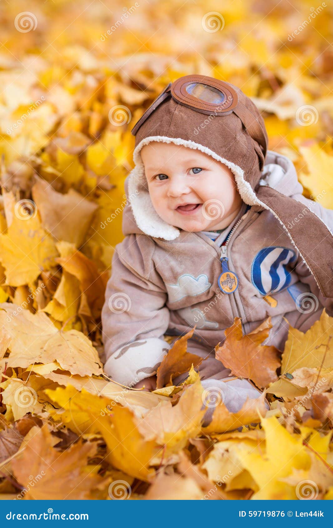 Cute Baby in Autumn Leaves. Stock Photo - Image of leaves, outdoors ...