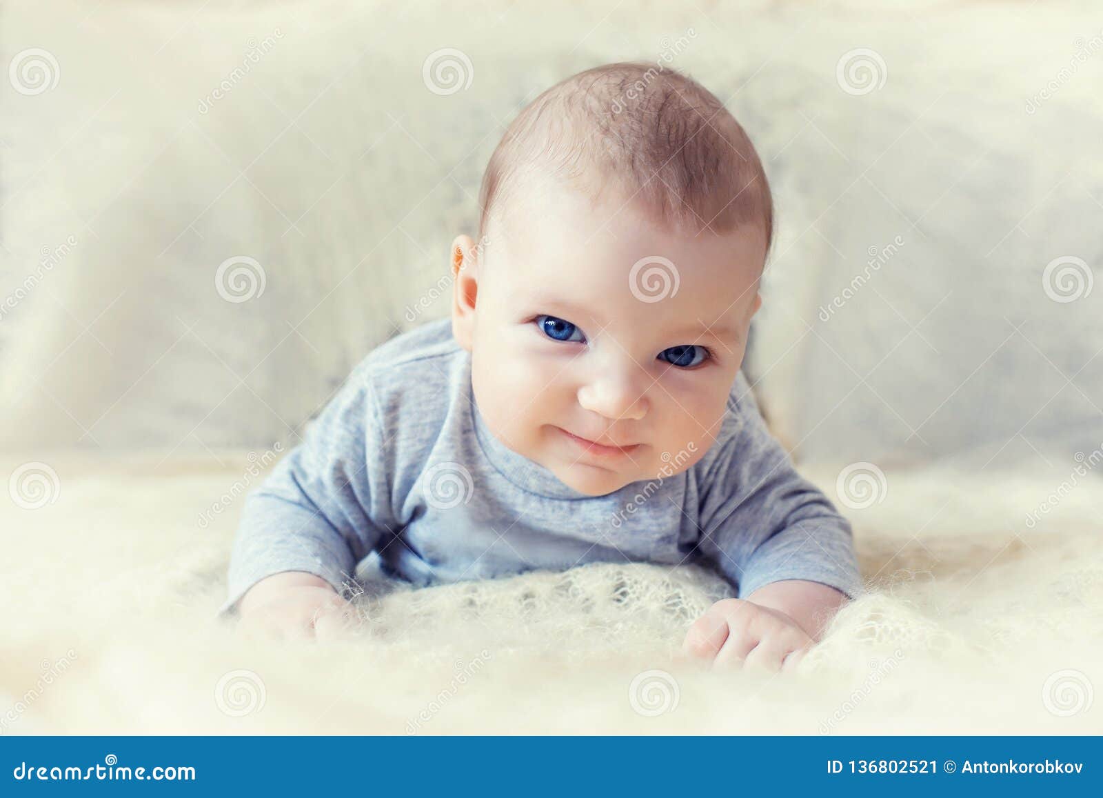 Cute Baby with Blue Eyes Crawling Forward Stock Image - Image of ...