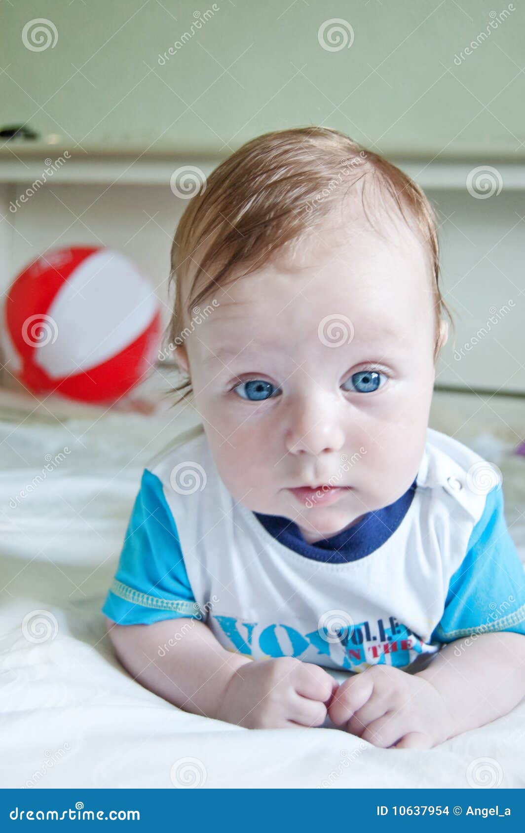 Cute Baby Boy Lying on His Belly Stock Photo - Image of arms, growing ...