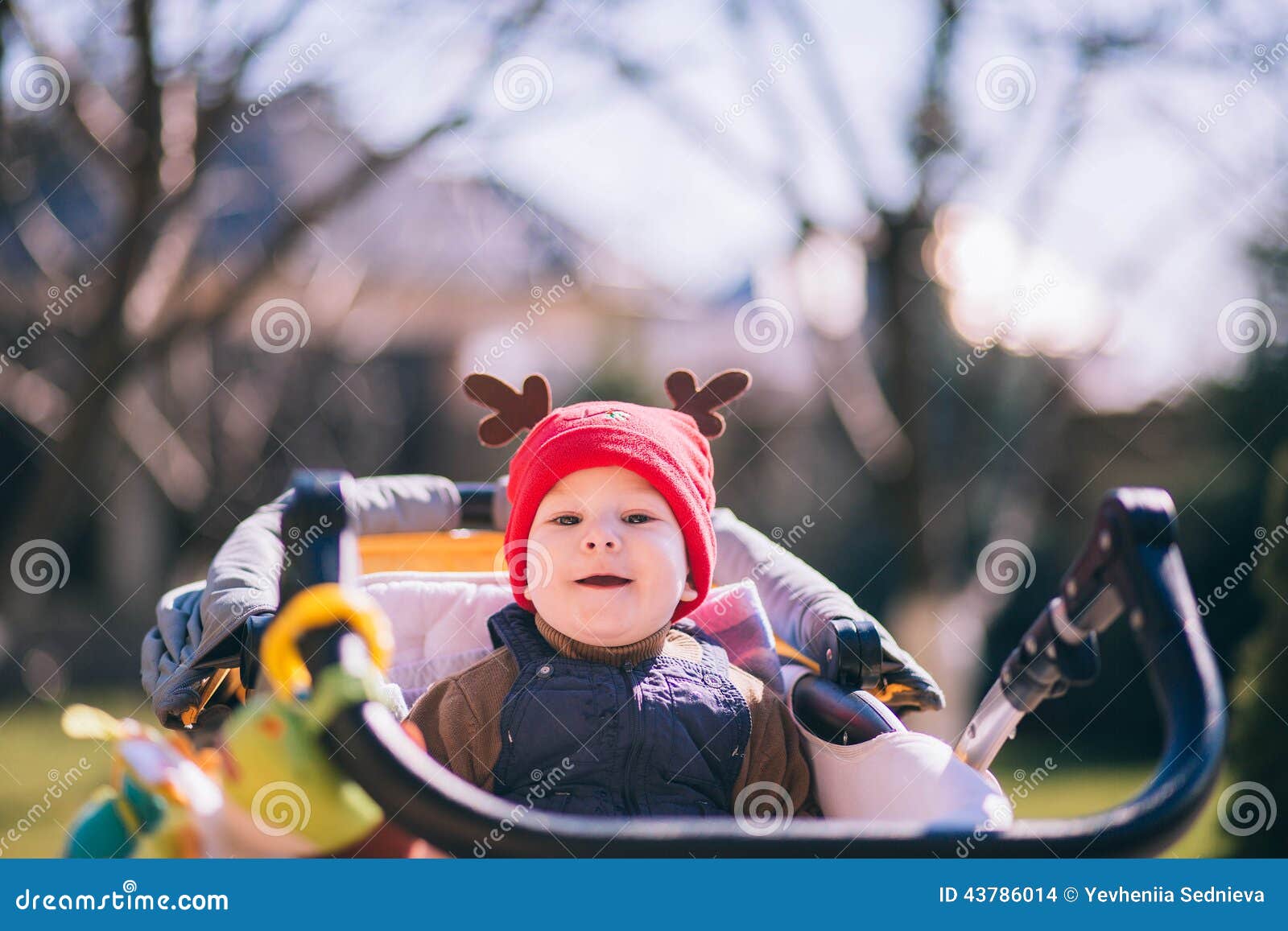 Cute Baby Boy Sitting in Stroller Stock Photo - Image of beautiful ...