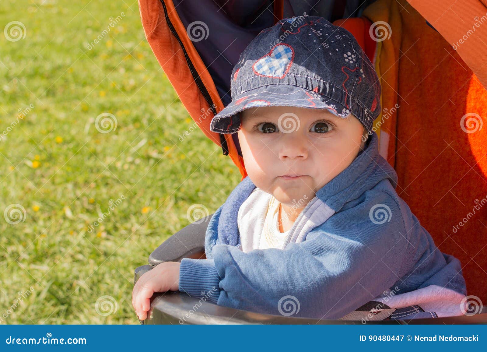 Cute Baby Boy in a Stroller Stock Image - Image of color, looking: 90480447