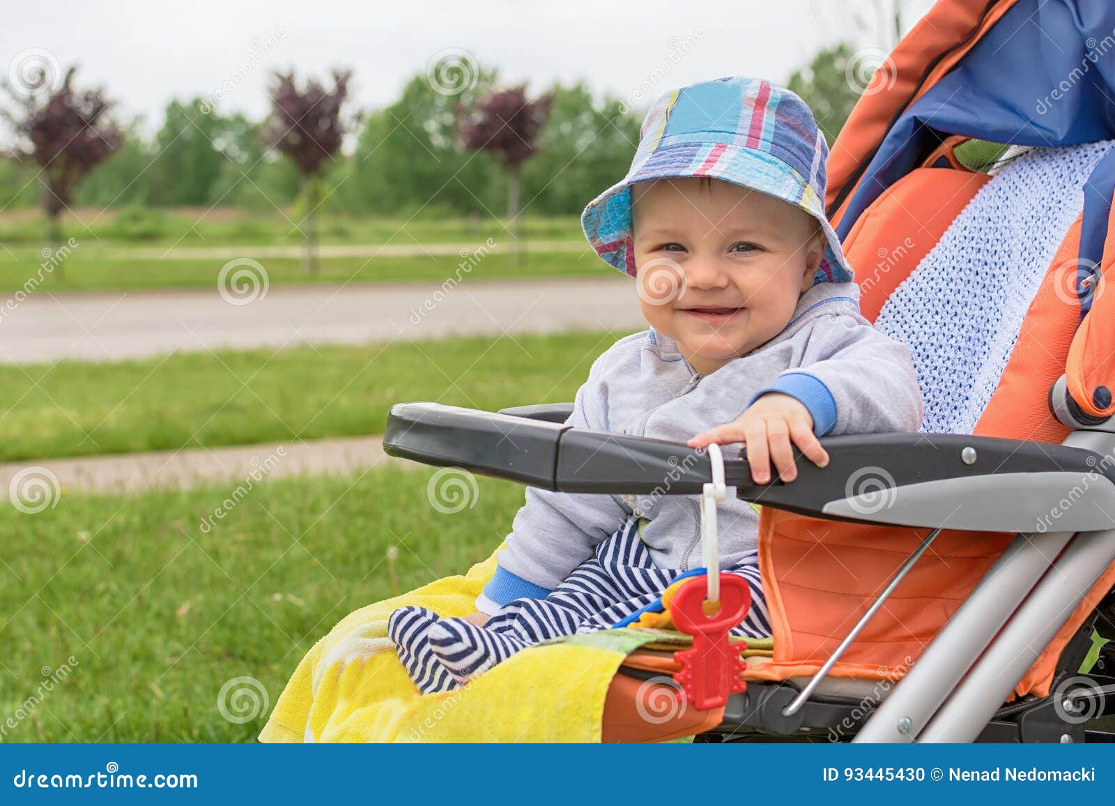 Cute Baby Boy in a Stroller Stock Photo - Image of beautiful, enjoyment ...