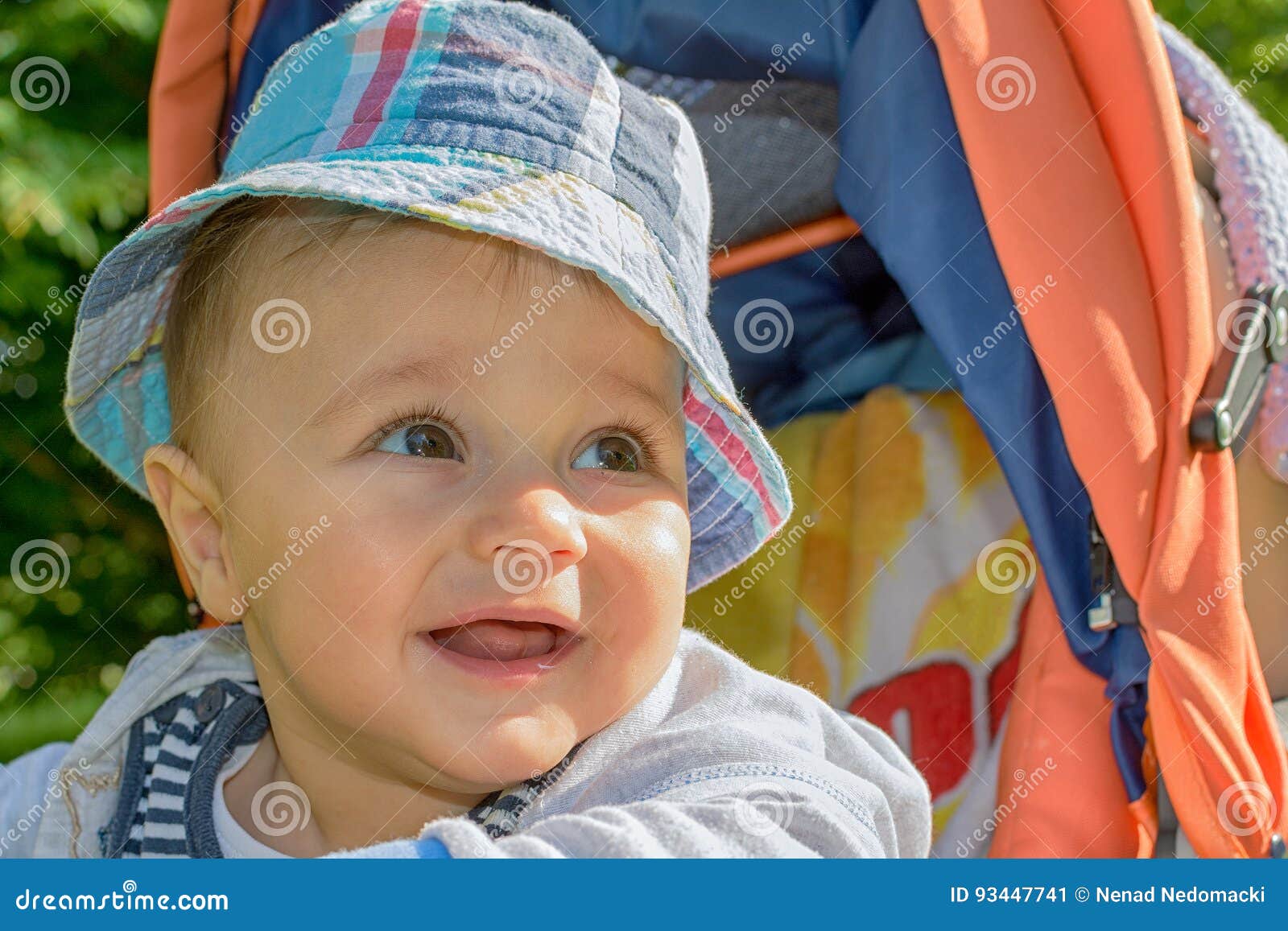 Cute Baby Boy in a Stroller Stock Image - Image of face, family: 93447741