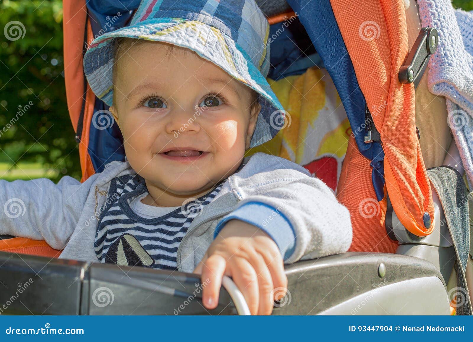 Cute Baby Boy in a Stroller Stock Photo - Image of jacket, months: 93447904