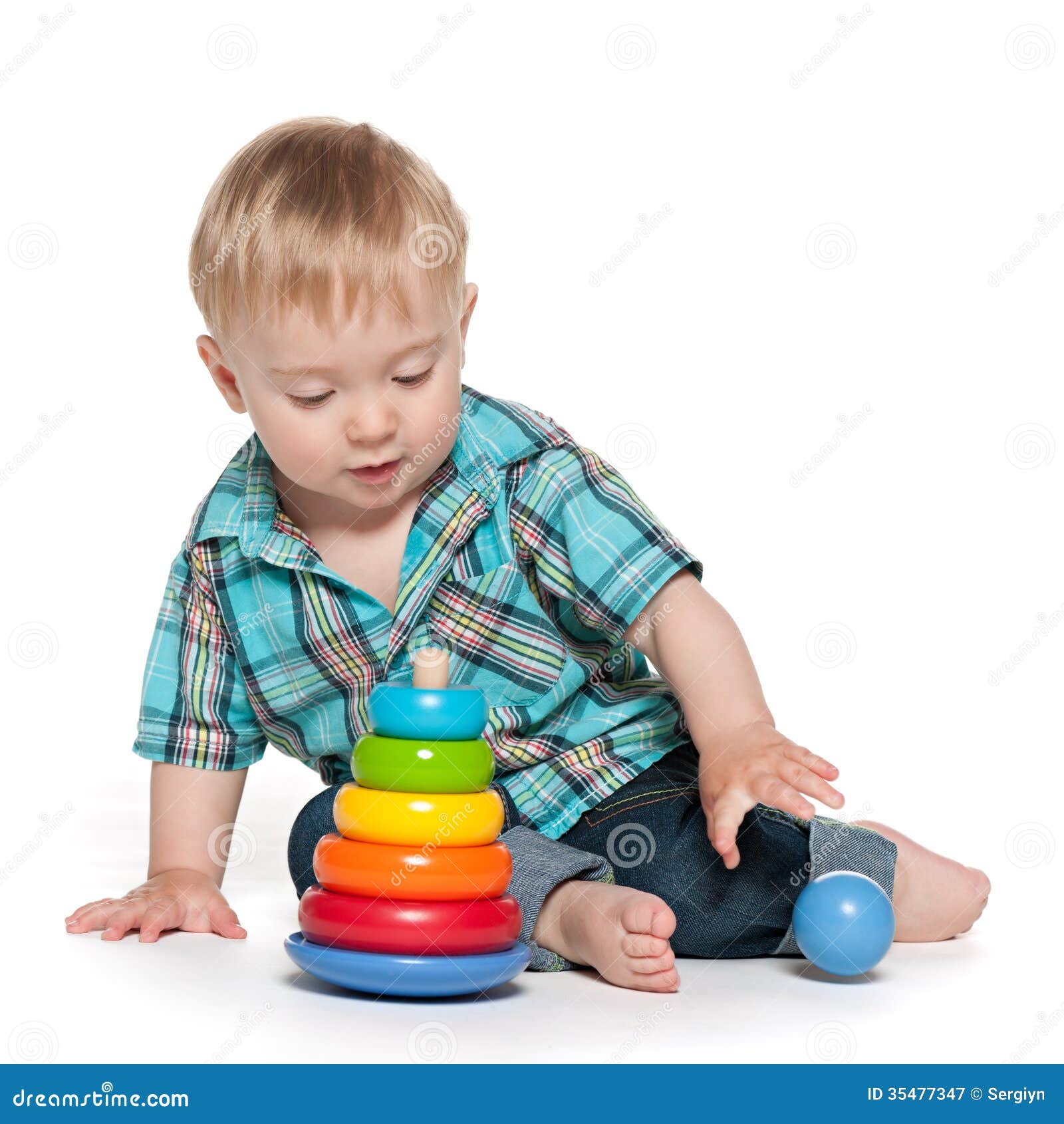 Cute baby boy with toy stock image. Image of sitting - 35477347