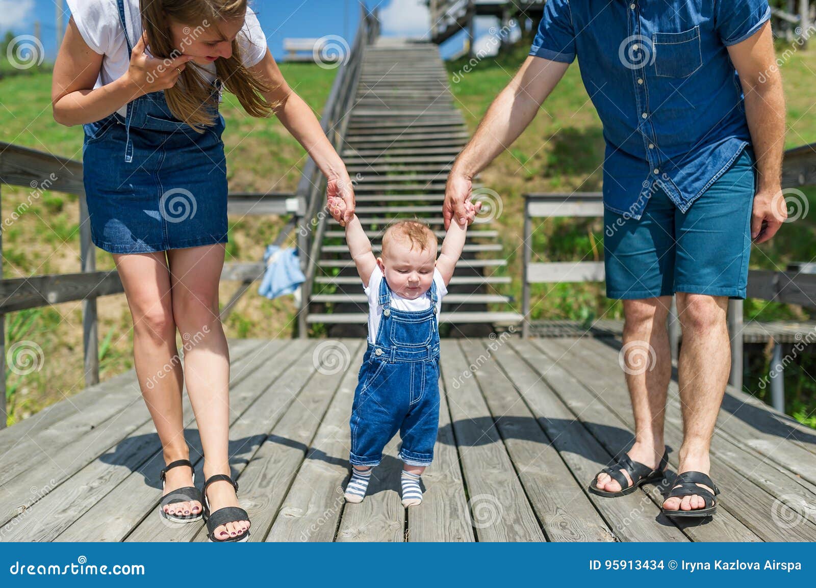 Cute Baby Boy Walking in Park with Parents Stock Photo - Image of ...