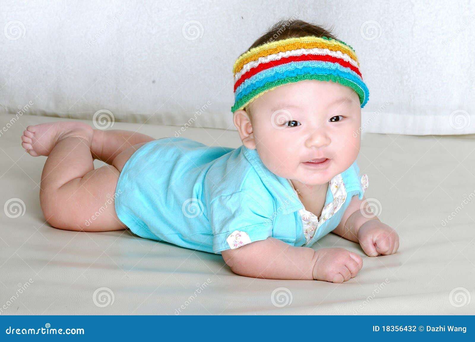 Cute Baby with Colorful Cap Stock Photo - Image of cherubic, chew: 18356432