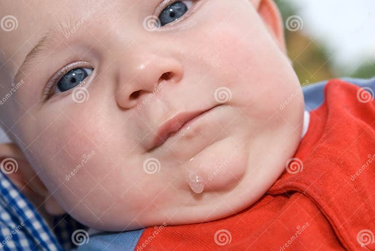 Cute Baby Drooling stock photo. Image of portrait, blue - 10834560