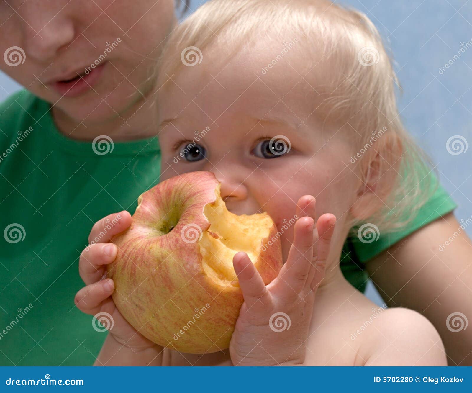 Cute baby eats an apple stock photo. Image of enjoyment - 3702280