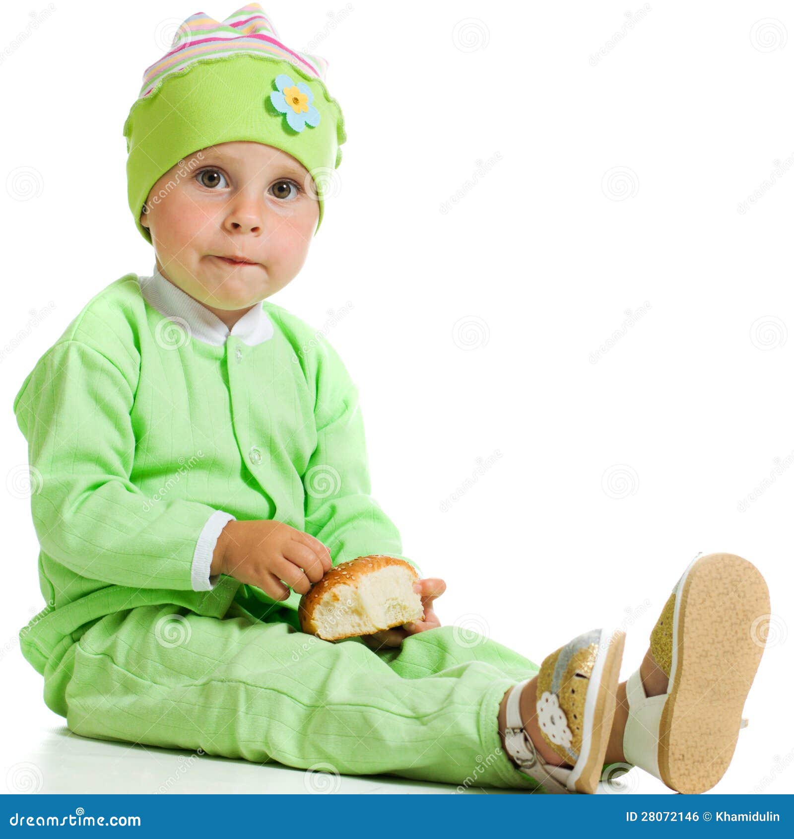 Cute baby eats the bread stock photo. Image of grain - 28072146