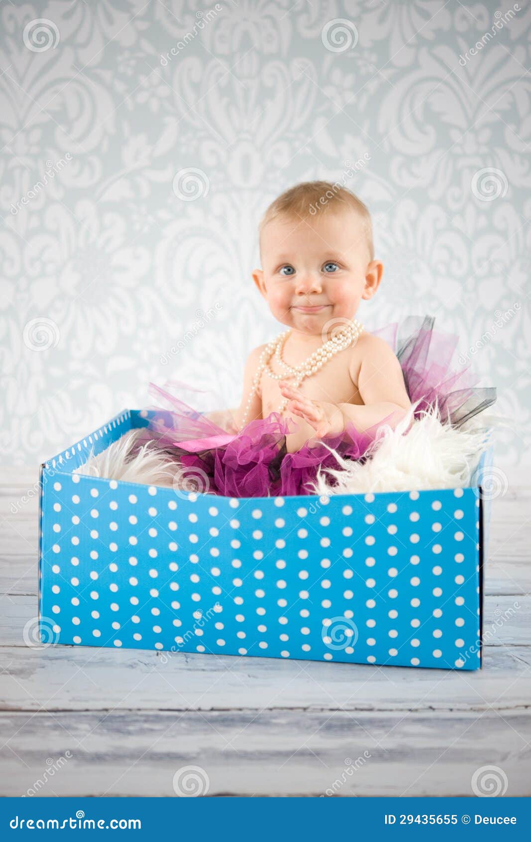 Cute baby girl in the box stock image. Image of looking - 29435655