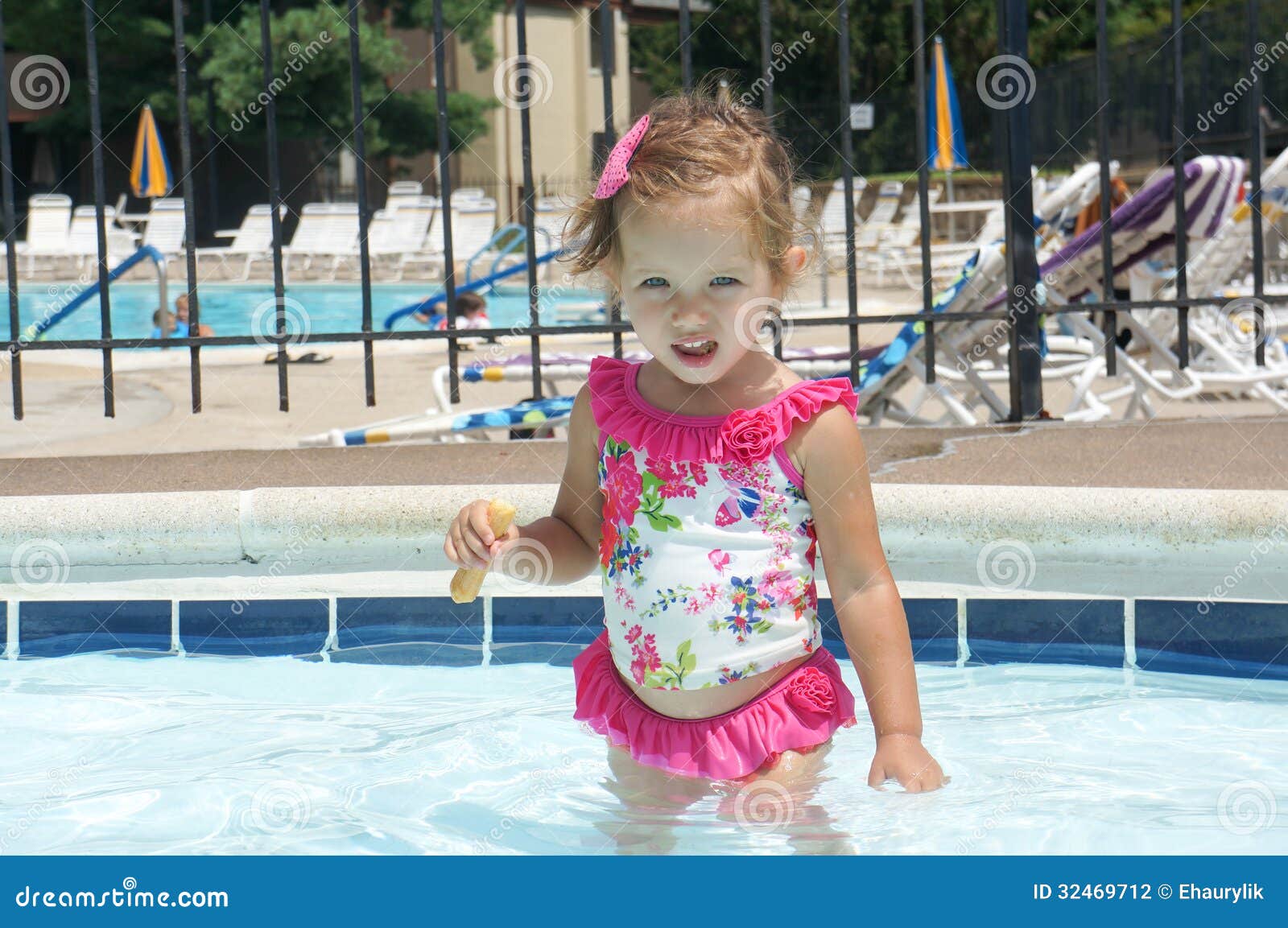 Cute Baby Girl is Having Fun in the Pool Stock Photo - Image of humor ...