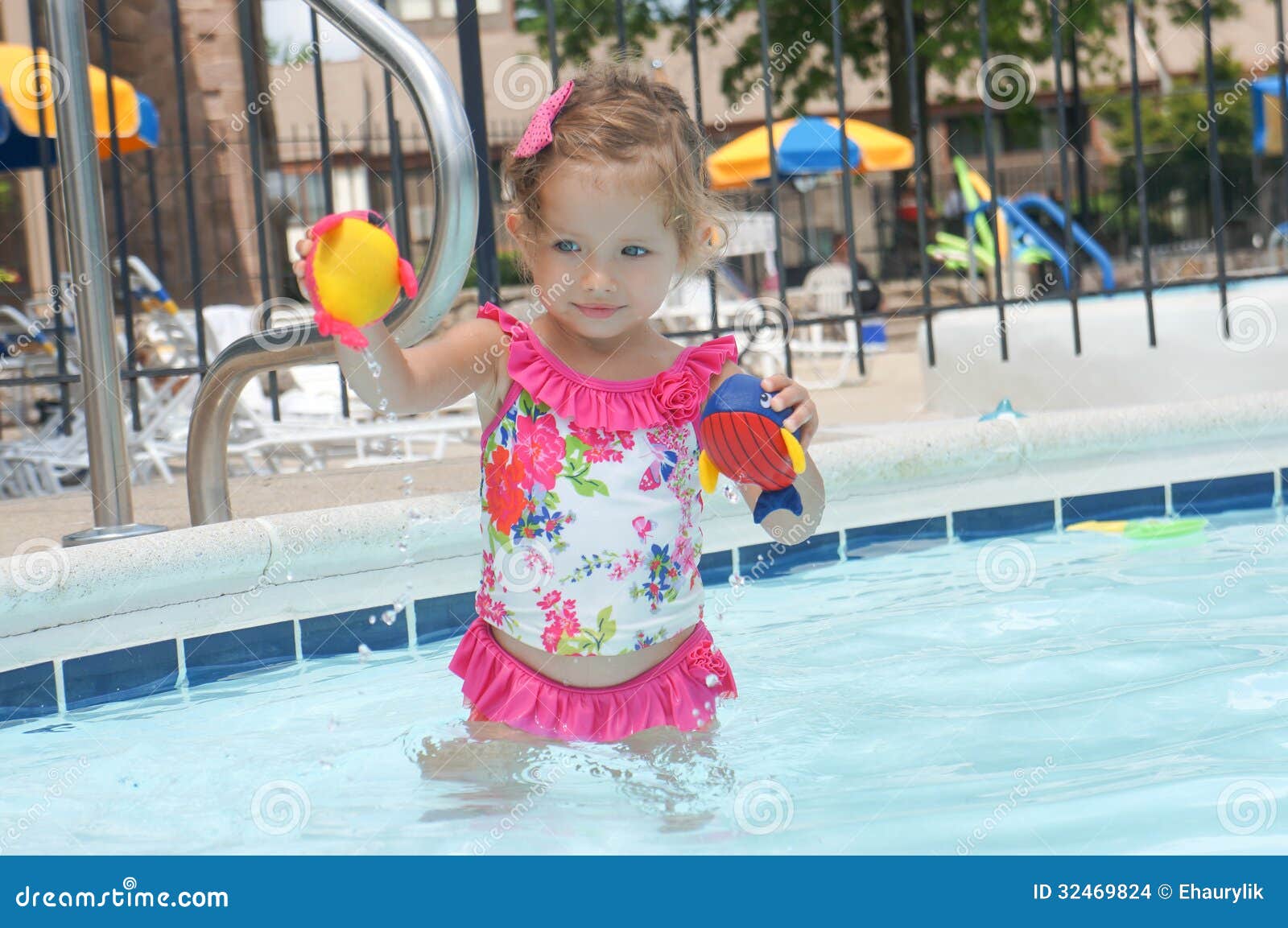 Cute Baby Girl is Having Fun in the Pool Stock Photo - Image of ...
