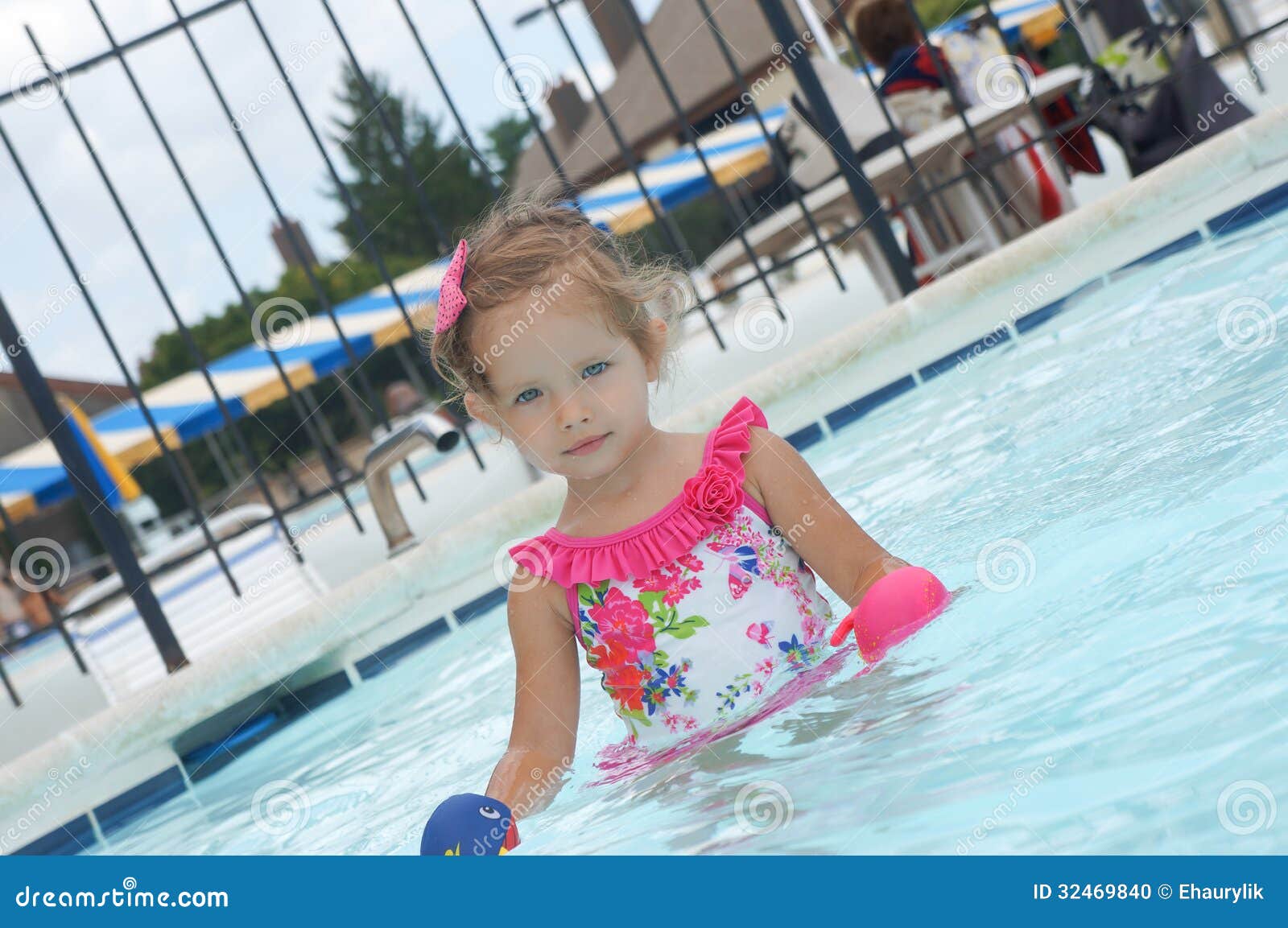 Cute Baby Girl is Having Fun in the Pool Stock Photo - Image of head ...