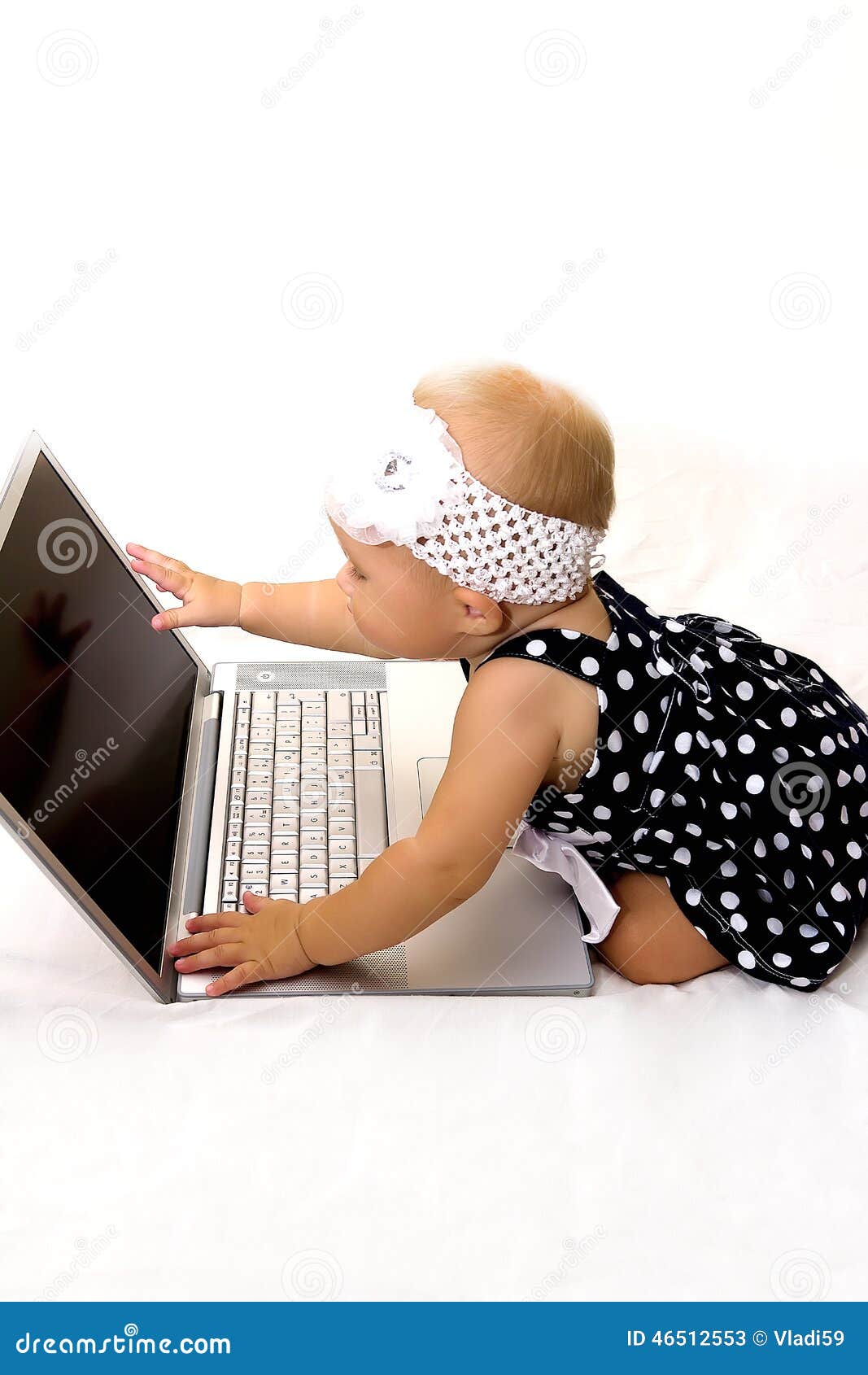 Cute baby with a laptop. stock image. Image of remote - 46512553