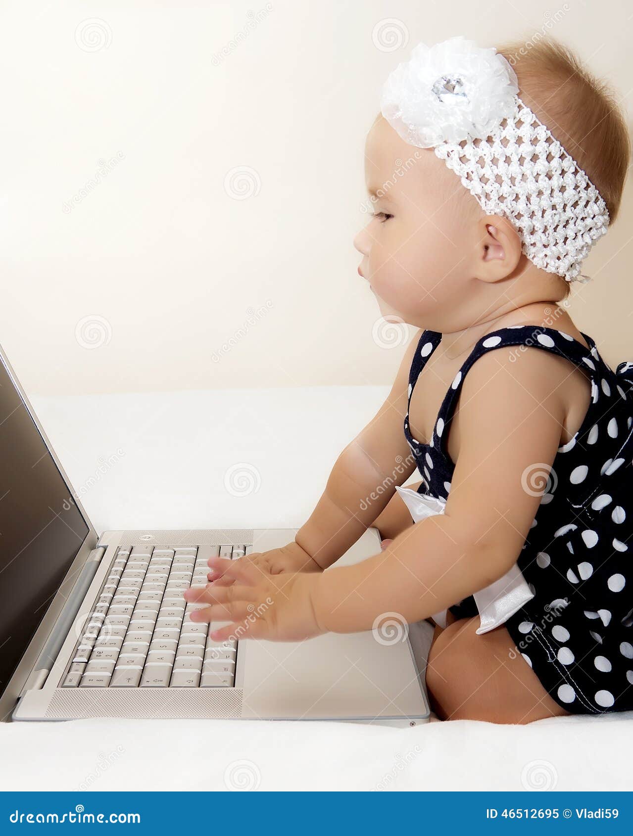 Cute baby with a laptop. stock image. Image of computer - 46512695