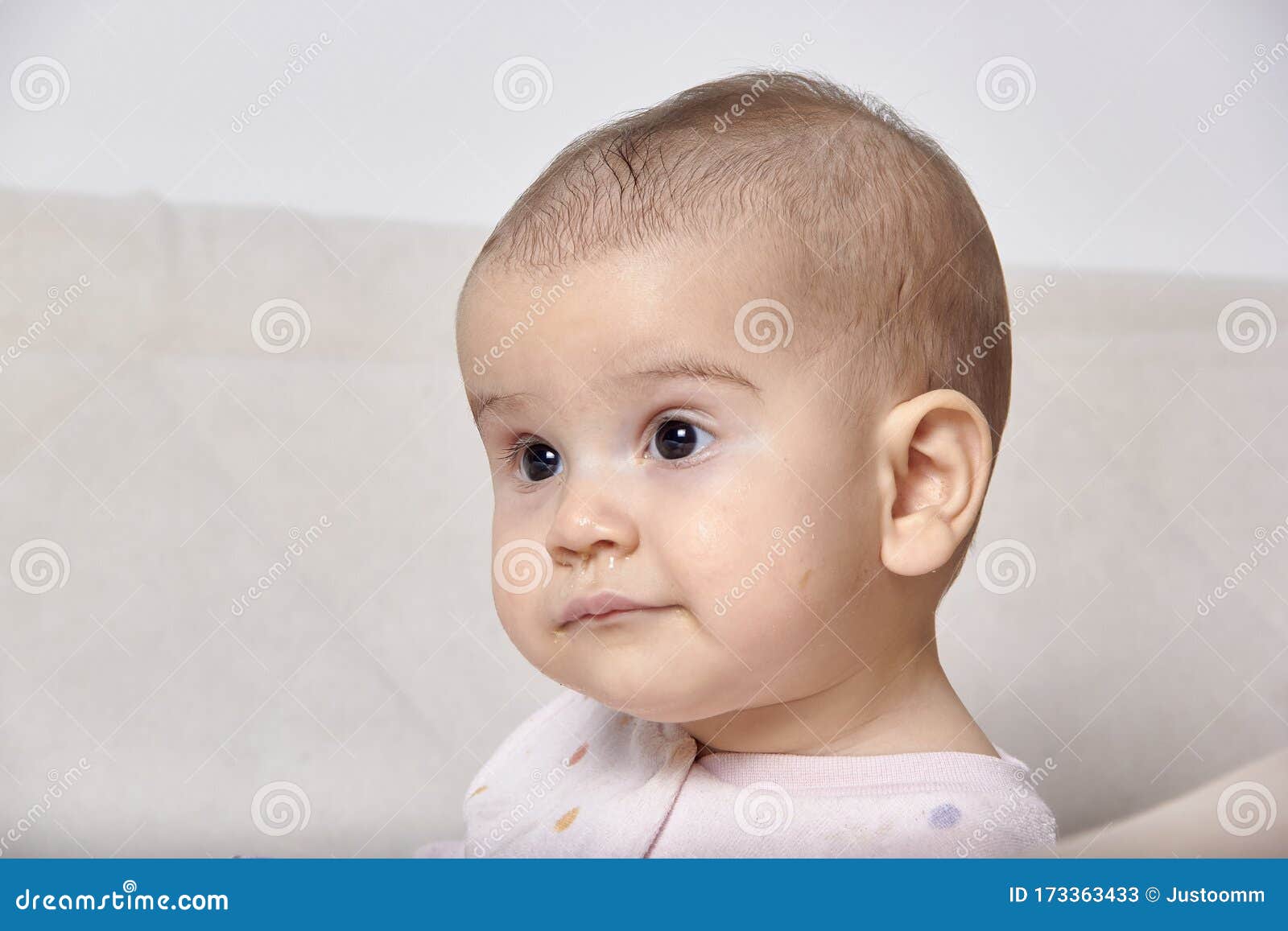Cute Baby with a Look of Trust on a Light Background Stock Image ...