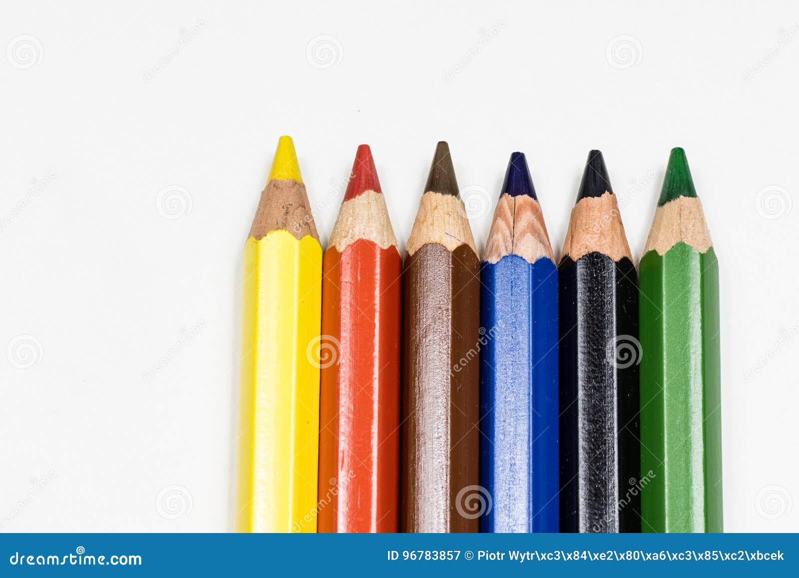 Cute Baby Pencil Crayons on a White Table. Isolated Background Stock ...