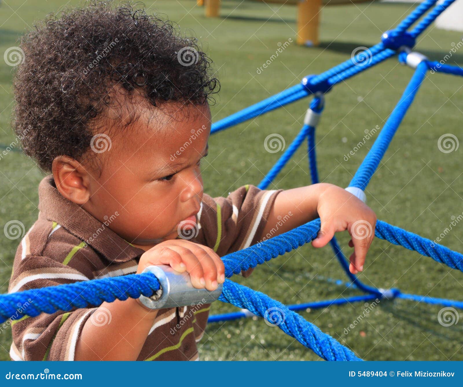 Cute Baby on a Playground stock photo. Image of american - 5489404