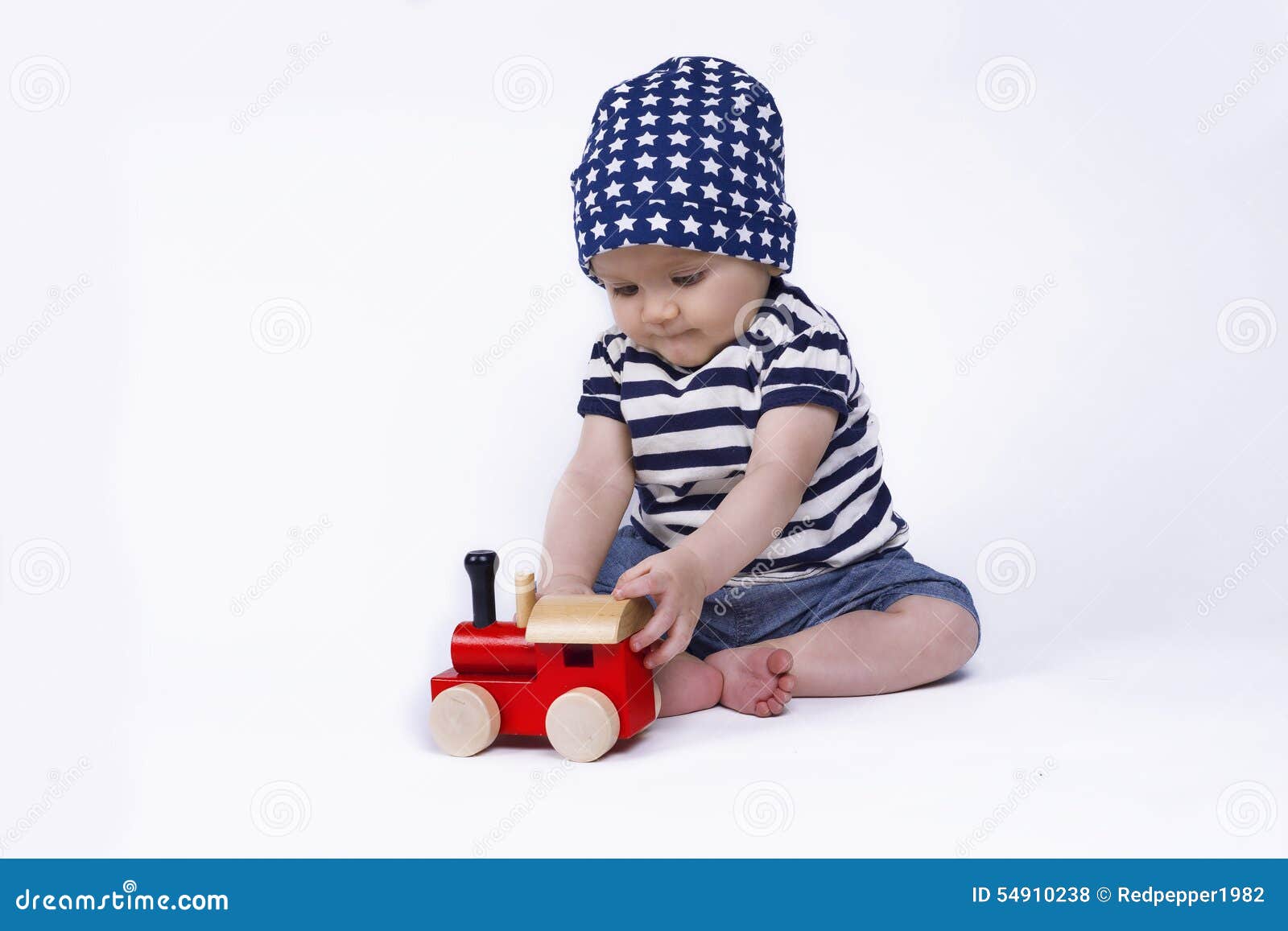 Cute Baby Playing with a Little Train Stock Photo - Image of lifestyle ...
