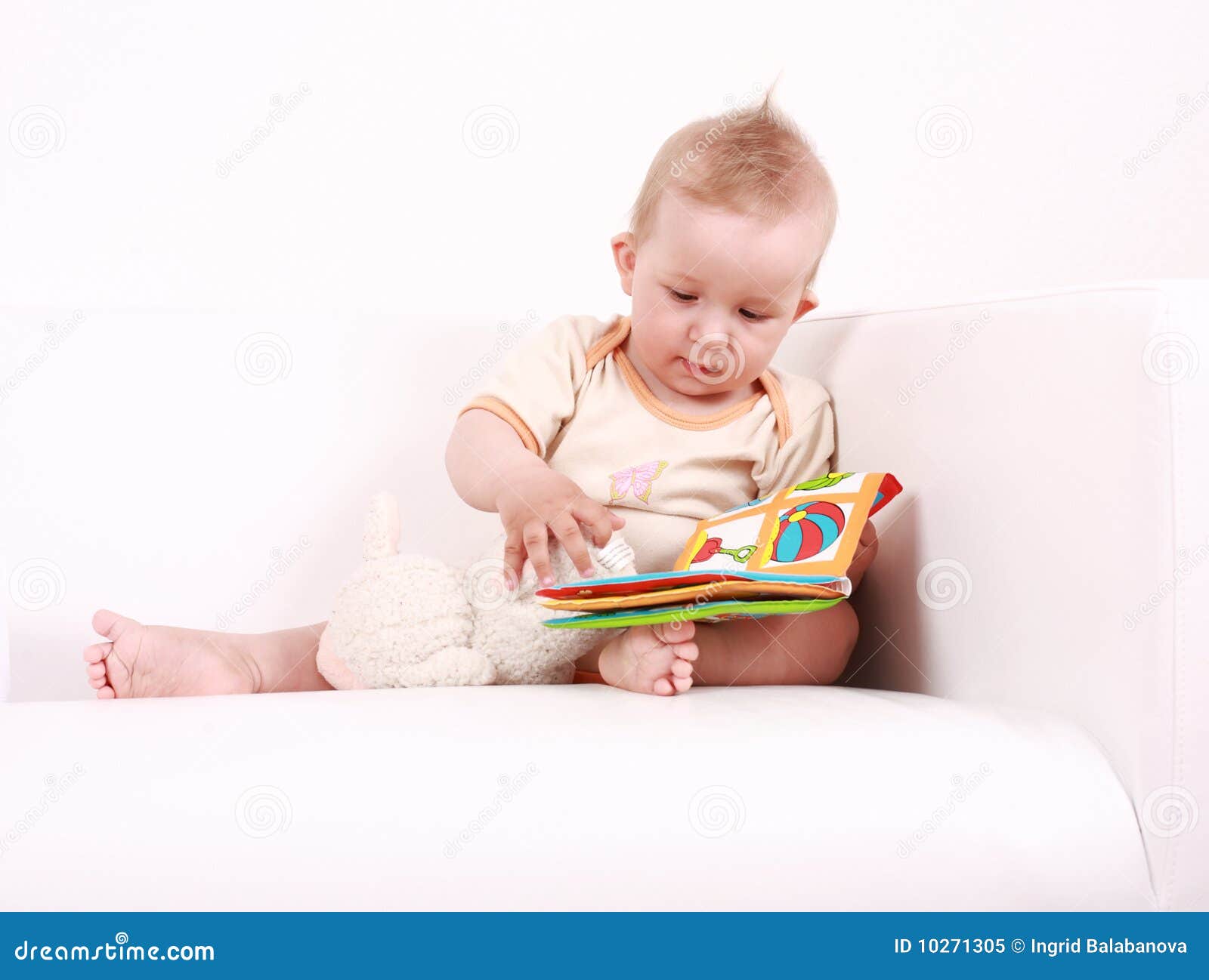 Cute baby reading stock image. Image of look, baby, play - 10271305