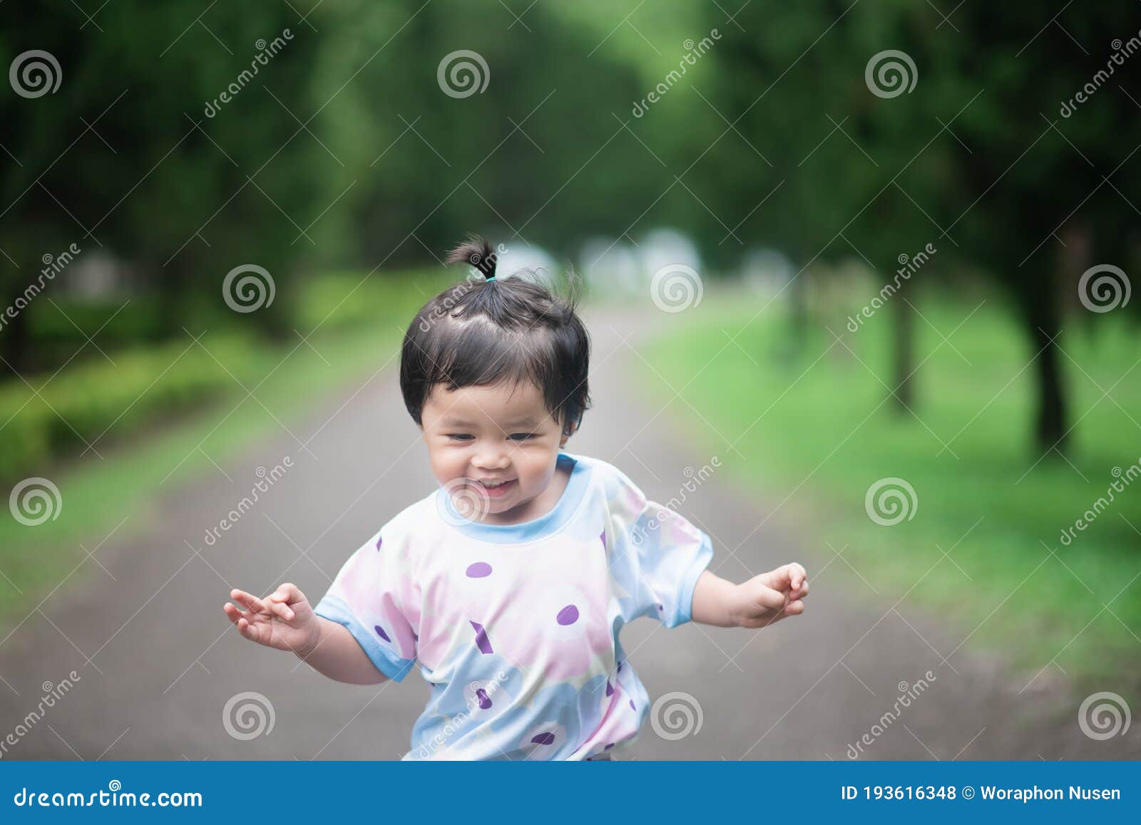 Cute Baby Running in the Garden Stock Photo - Image of outdoors ...
