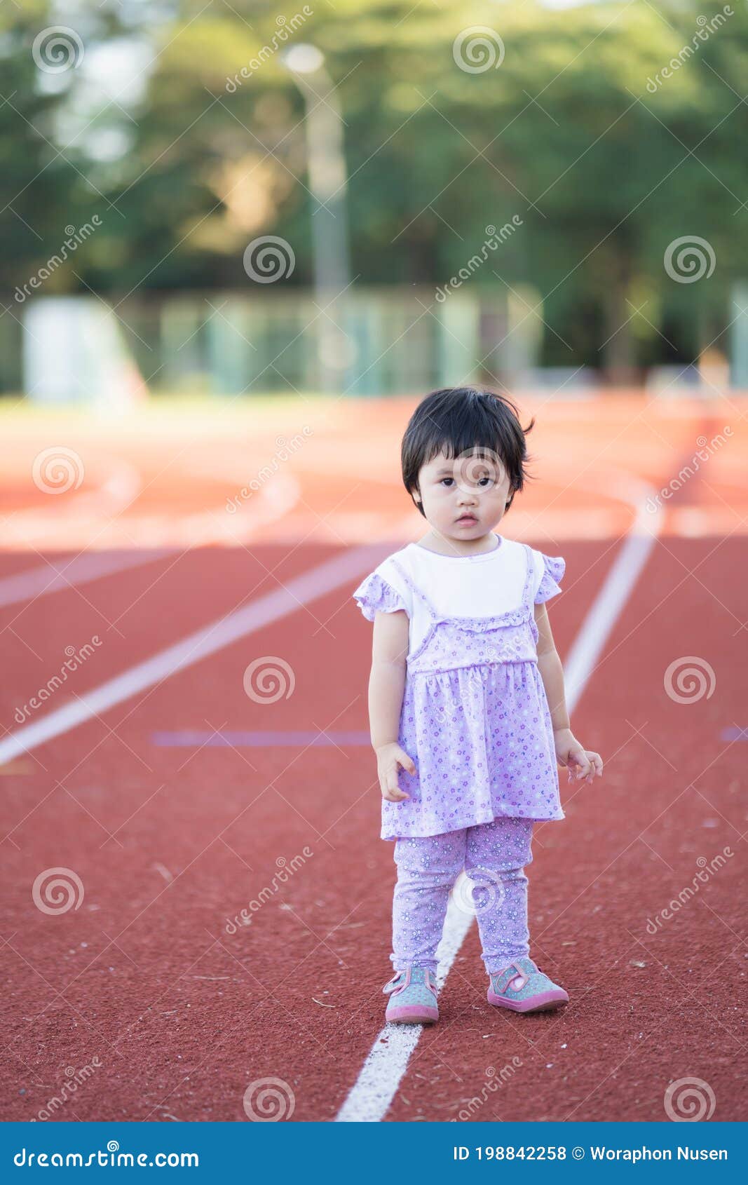 Cute Baby Running at Sport Stadium Stock Photo - Image of family, field ...