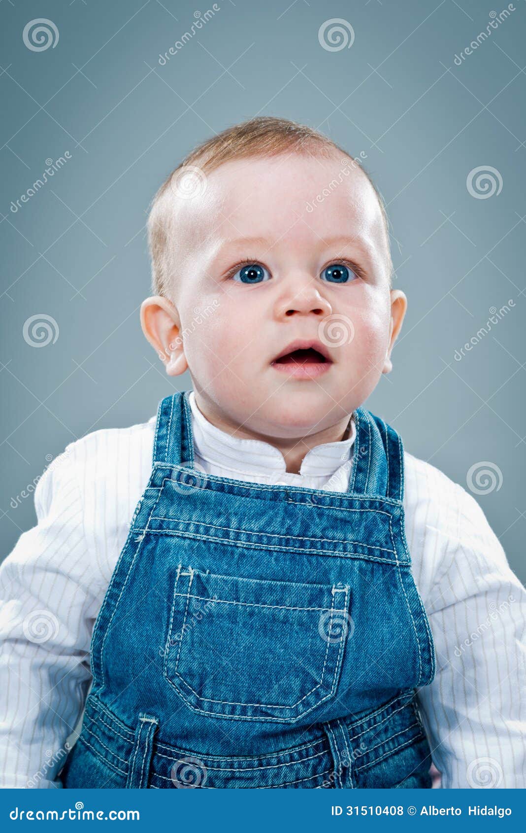 Cute Baby with Serious Expression Stock Photo - Image of real, healthy ...