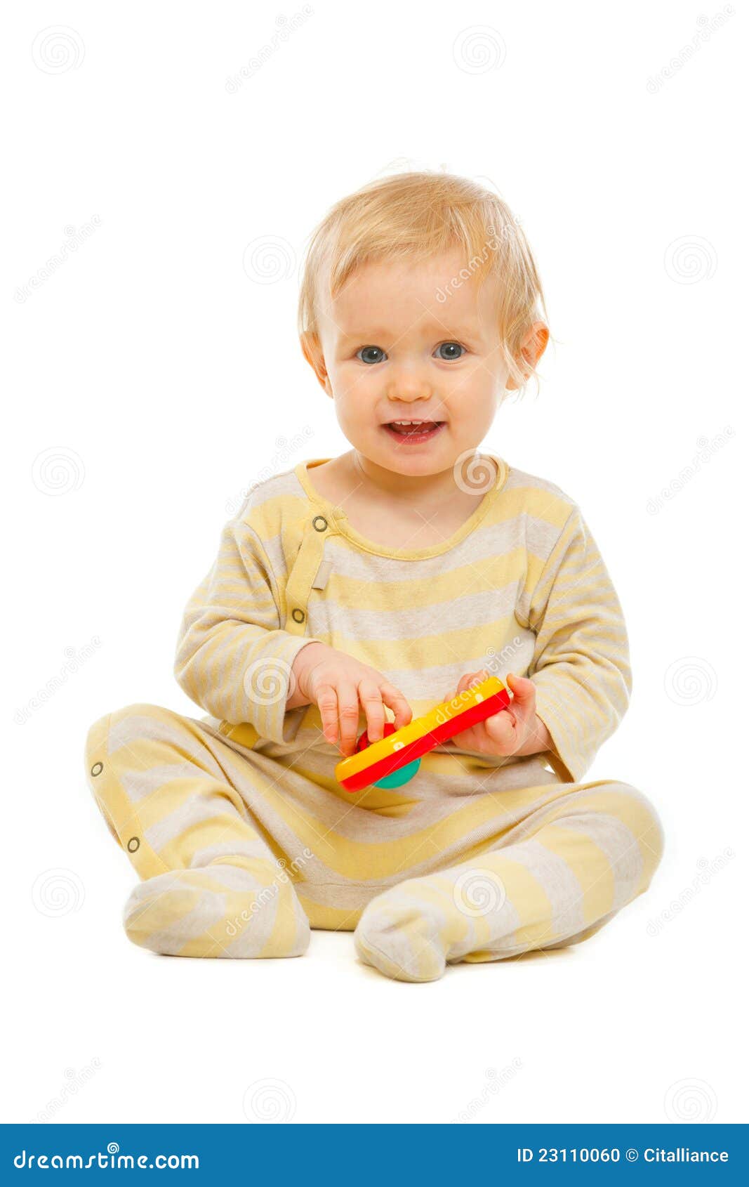 Cute Baby Sitting on Floor and Playing with Rattle Stock Photo - Image ...