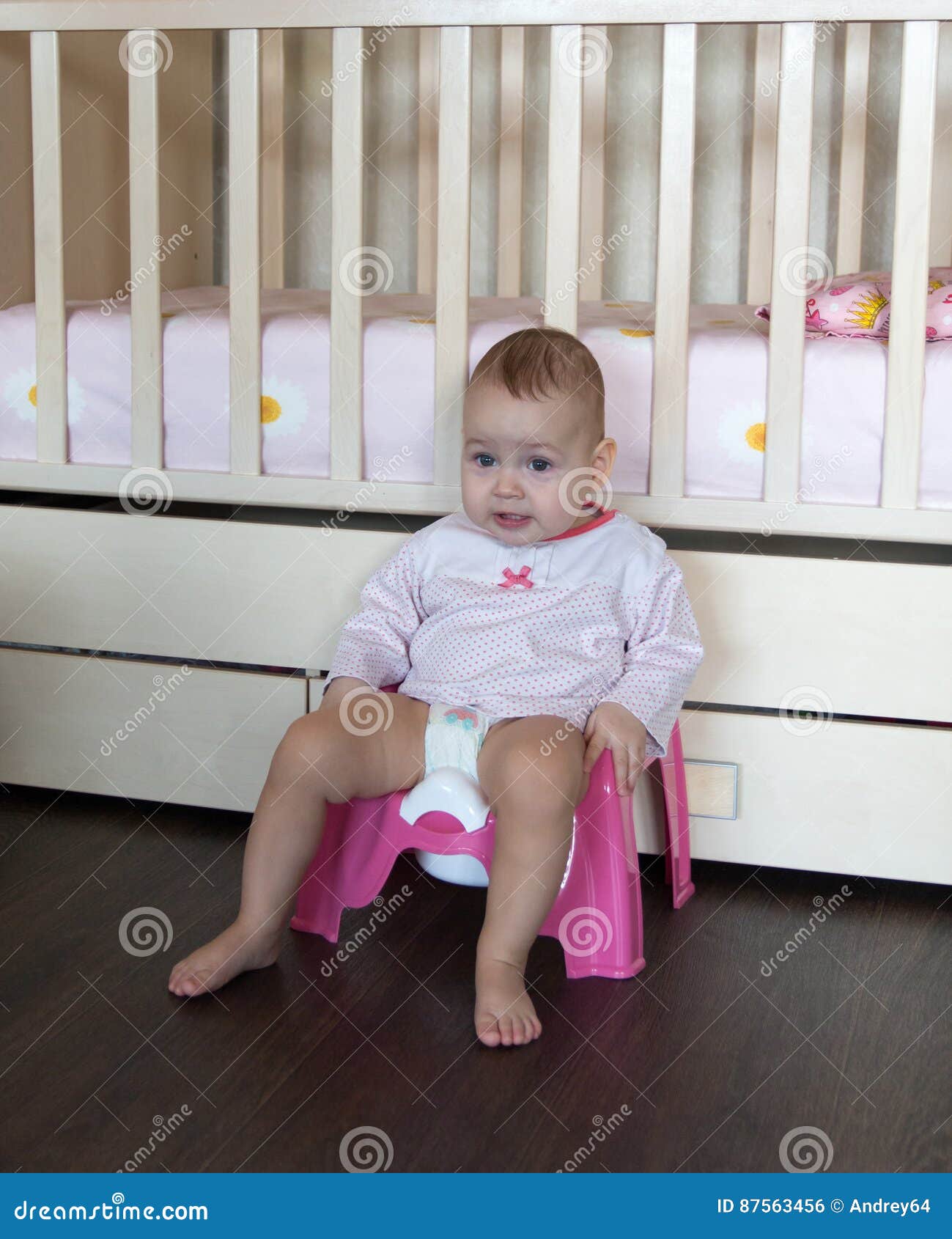 Cute baby sitting on a pot stock photo. Image of sanitary - 87563456