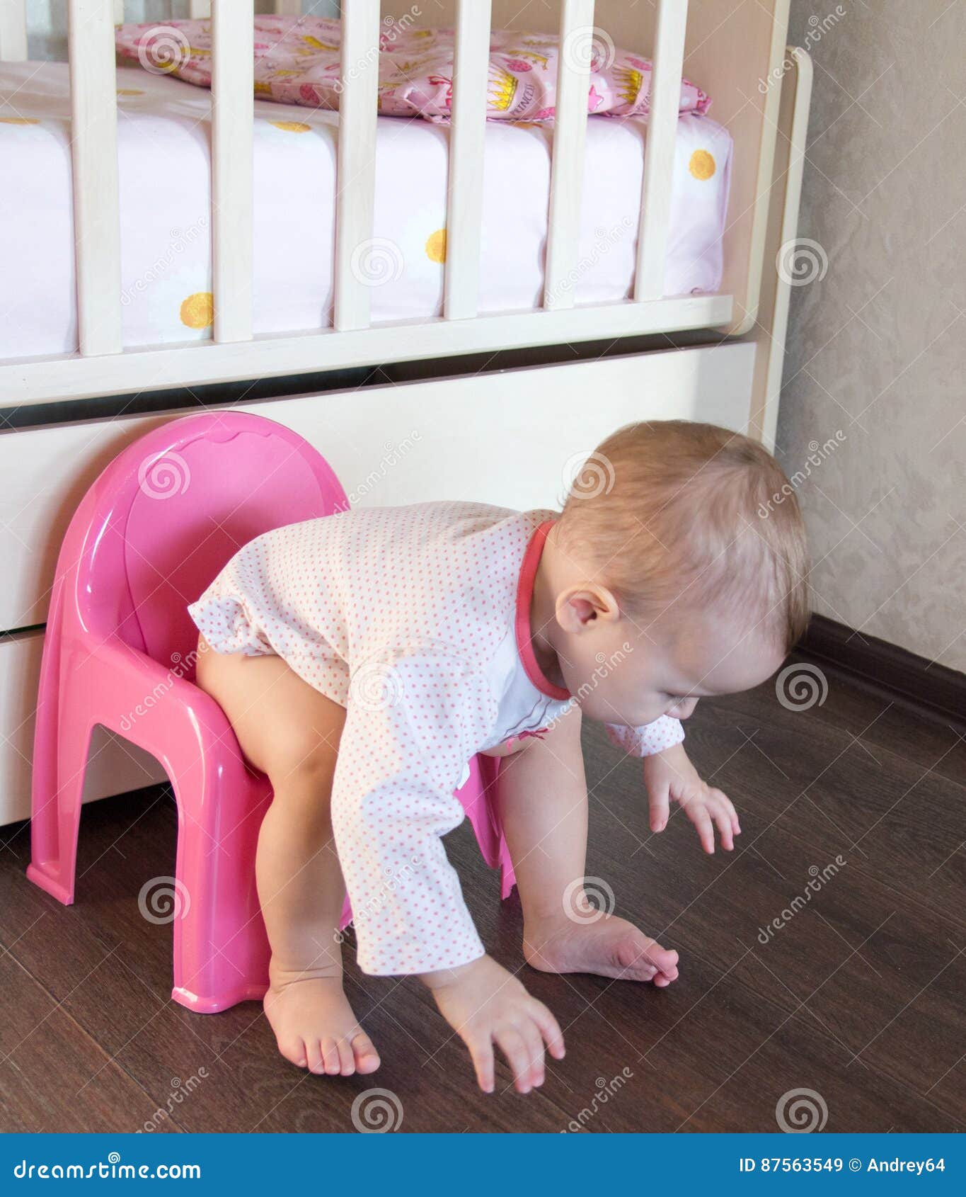 Cute baby sitting on a pot stock image. Image of play - 87563549