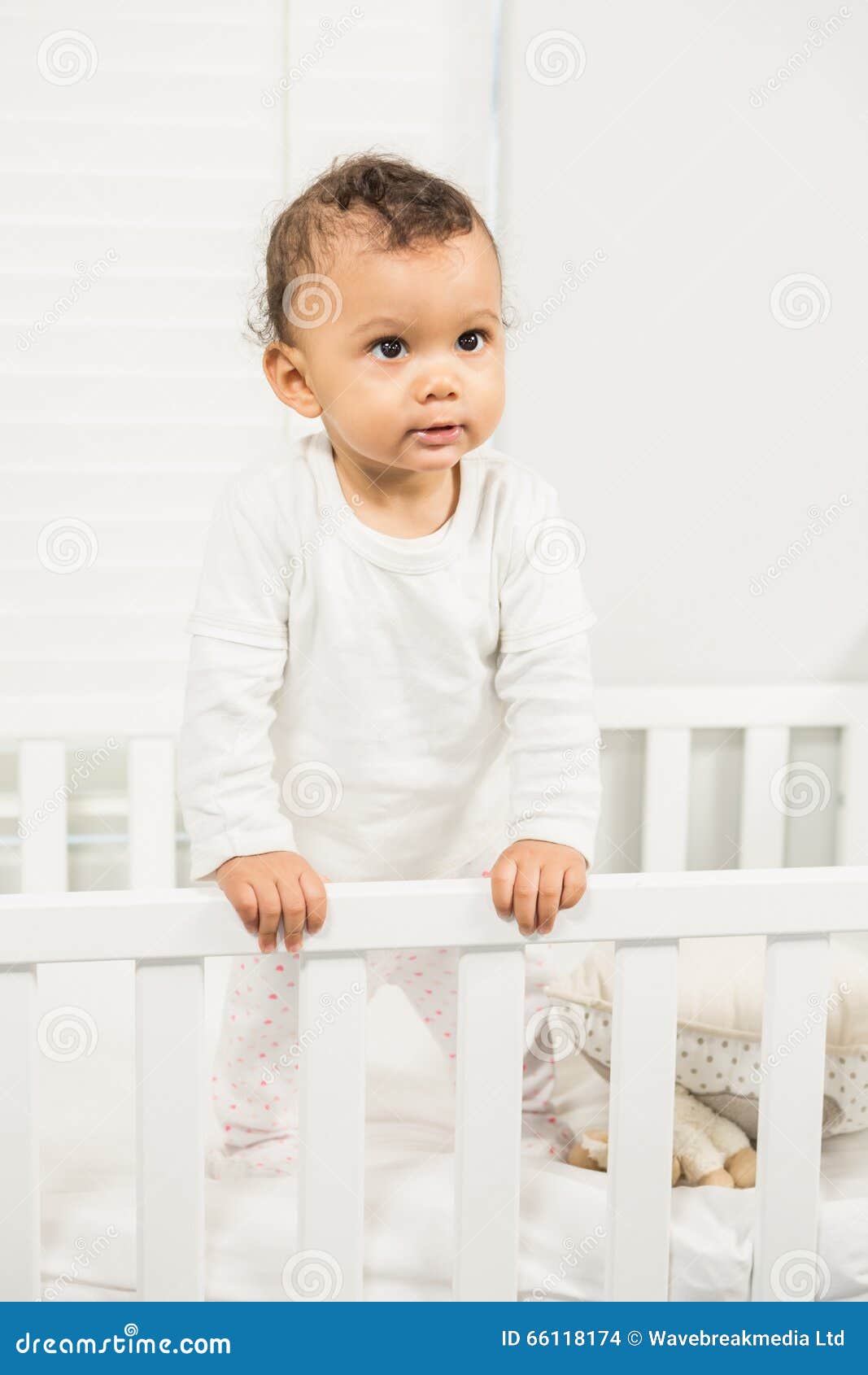Cute Baby Standing in the Crib Stock Photo - Image of brown, bedroom ...