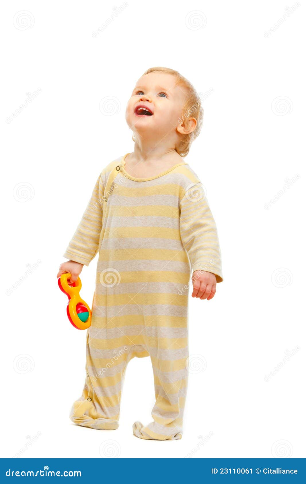 Cute Baby Standing with Rattle and Looking Up Stock Image - Image of ...
