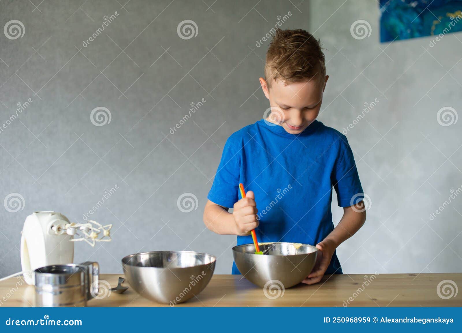 Cute Baby is Stirring the Ingredients for the Dough. Stock Image ...