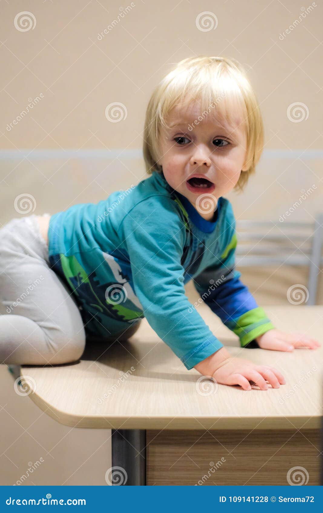 Cute baby at the table stock photo. Image of setting - 109141228