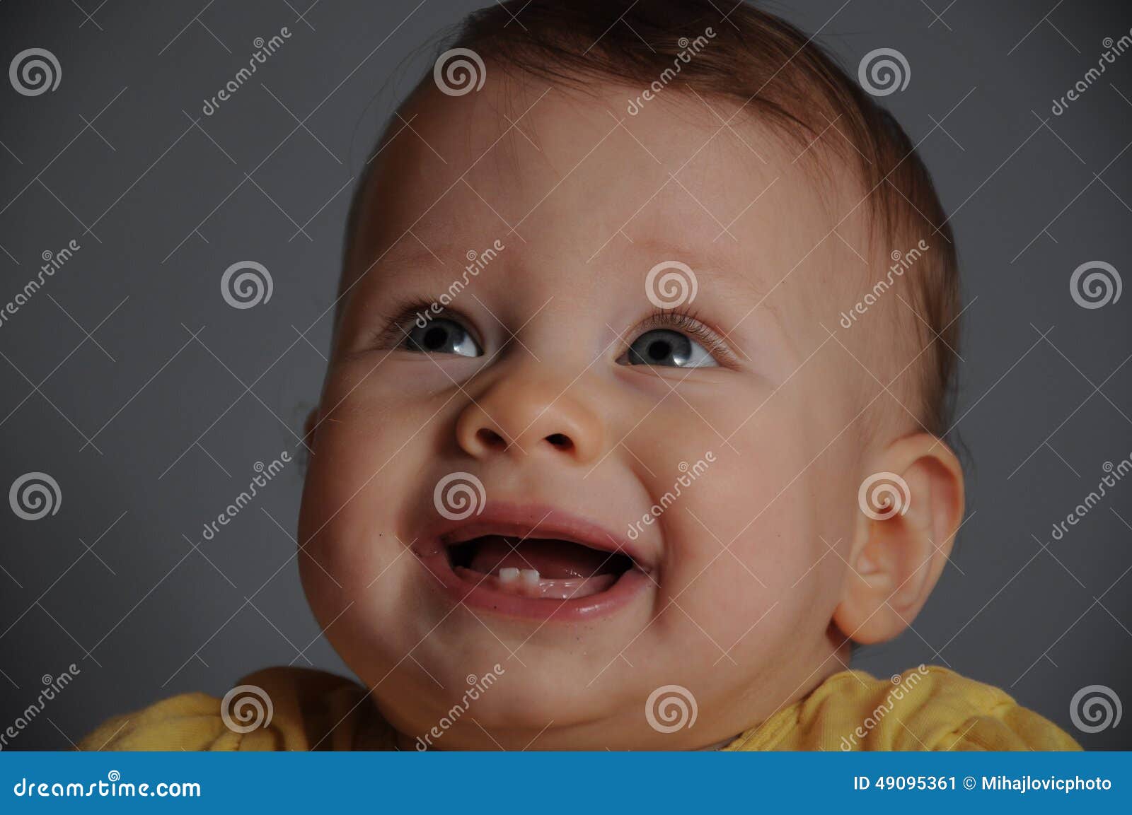 Cute baby with 2 teeth stock image. Image of caucasian - 49095361