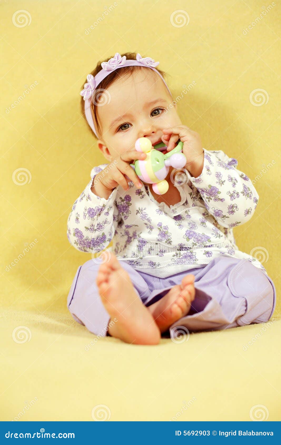 Cute baby with toy stock image. Image of looking, smile - 5692903